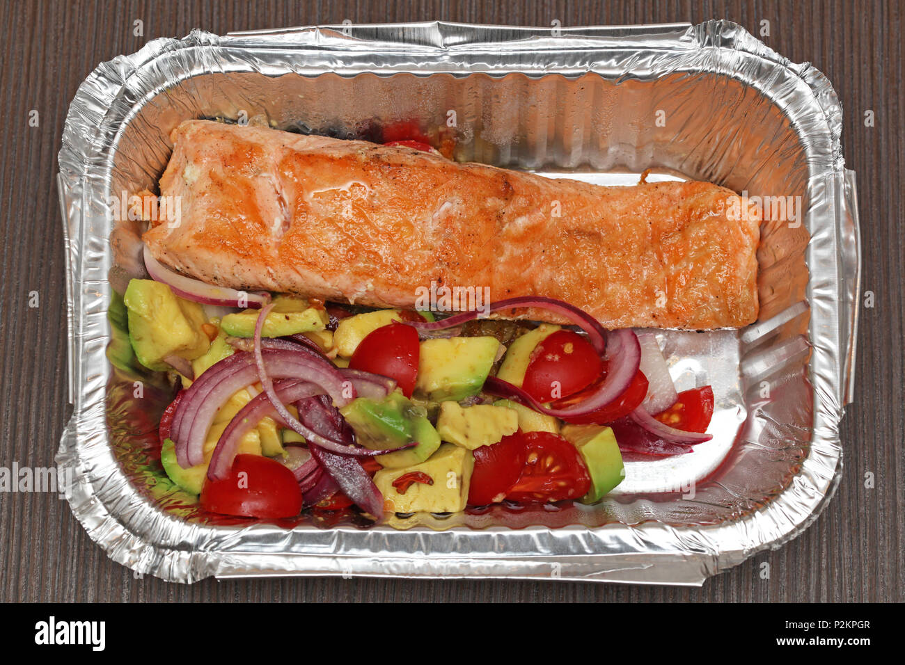 Salmon fillet with avocado salad in takeaway box hi-res stock ...