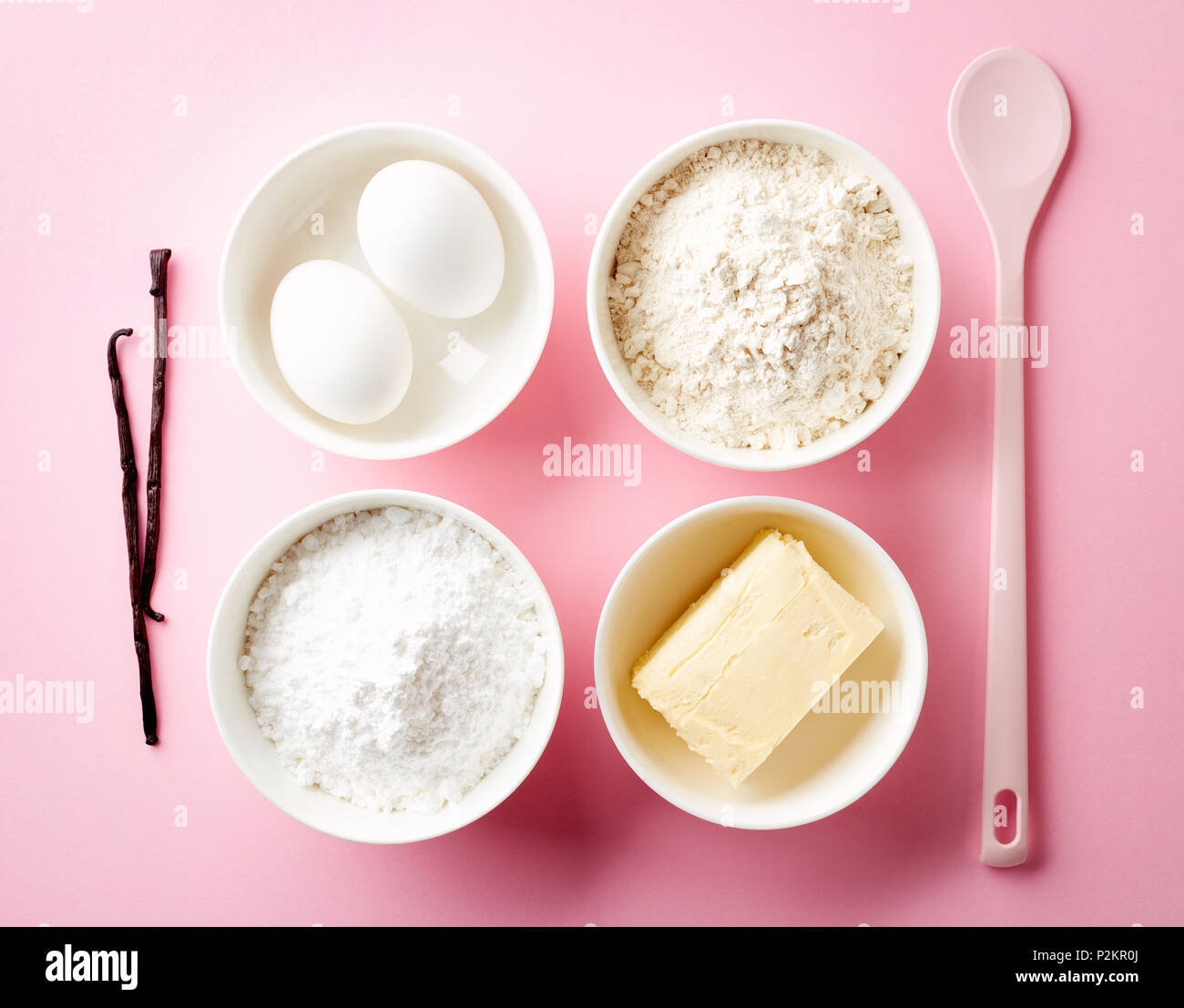 Baking ingredients for pastry on pink background; top view Stock Photo ...
