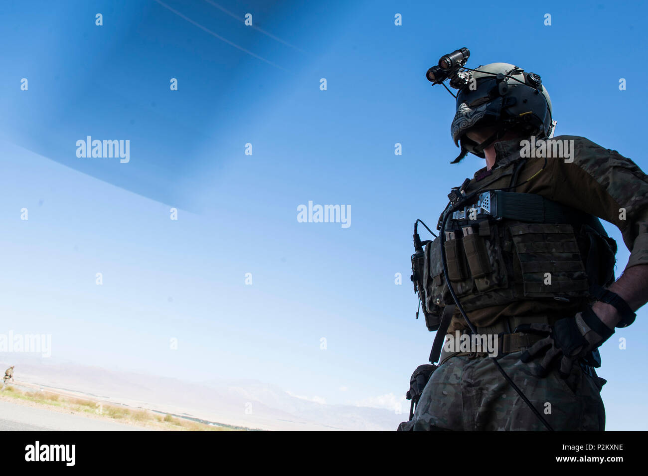 An HH-60 Pave Hawk aerial gunner assigned to the 83rd Expeditionary ...
