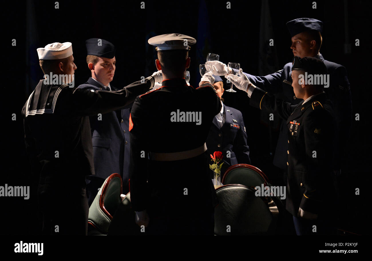 Team McChord Service Members perform a toast during the Prisoner of War ...