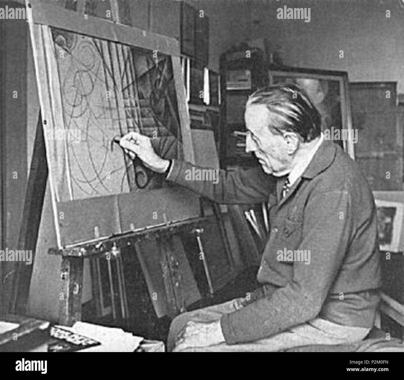 . Italiano: Gerardo Dottori nel suo studio. Français : Gerardo Dottori ...