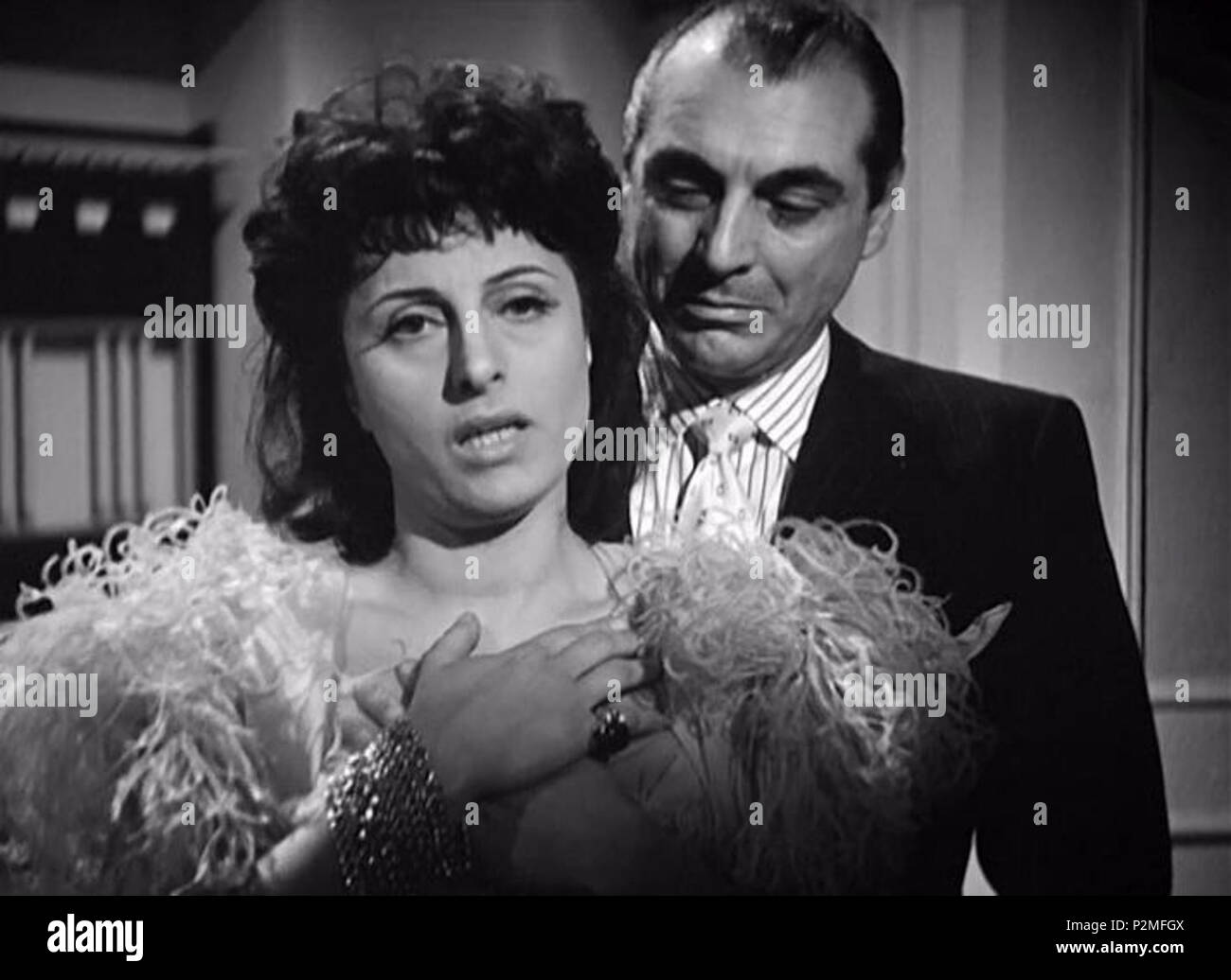 . Anna Magnani and Mino Doro in a scene of film Il bandito . 1948 ...