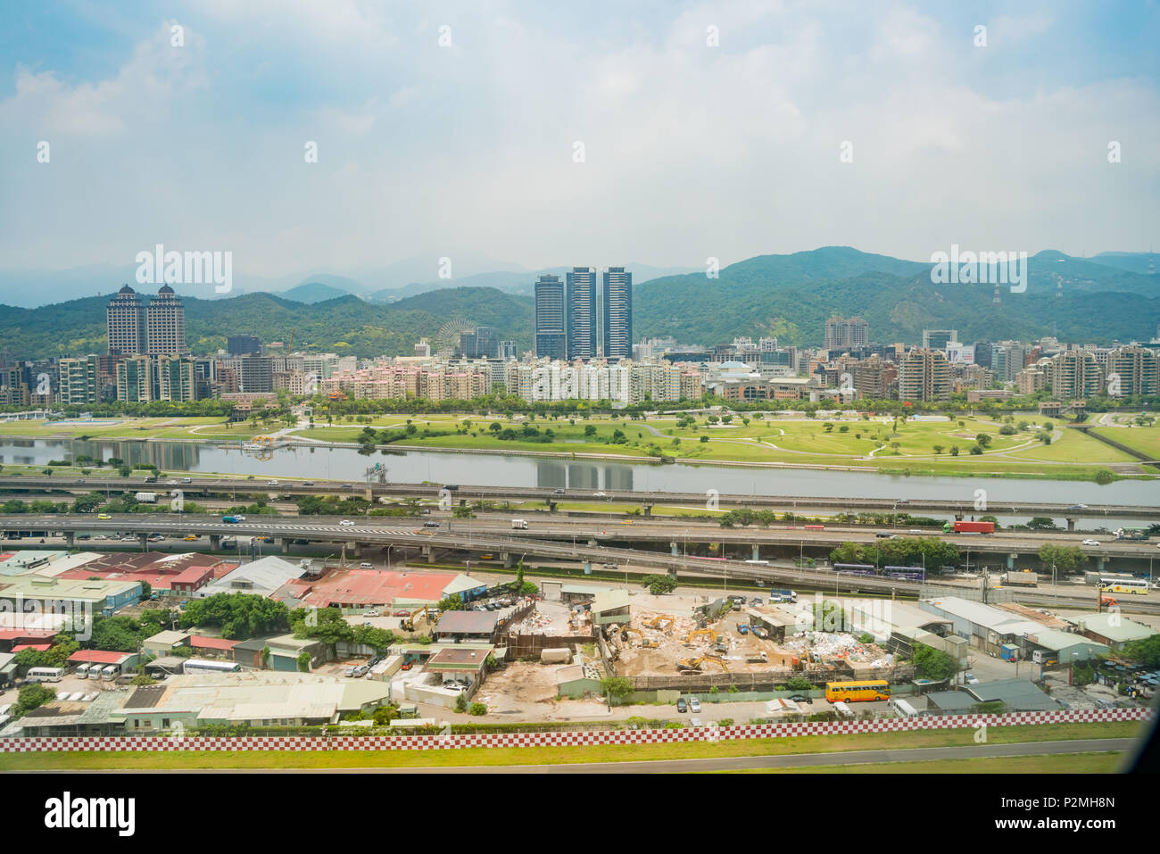 Aerial view of the beautiful Taipei City, from an airplane window seat ...