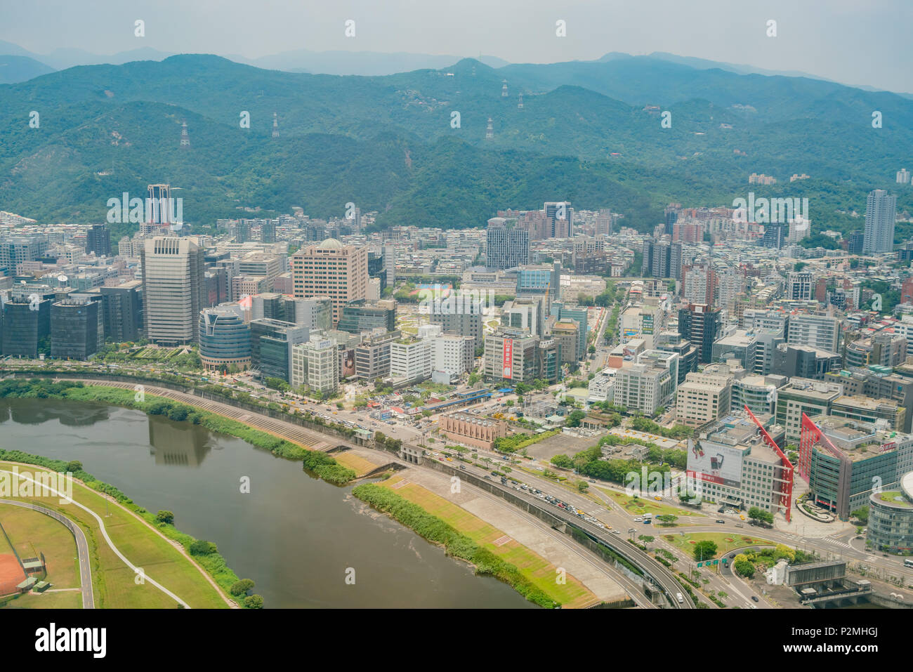 Aerial view of the beautiful Taipei City, from an airplane window seat ...