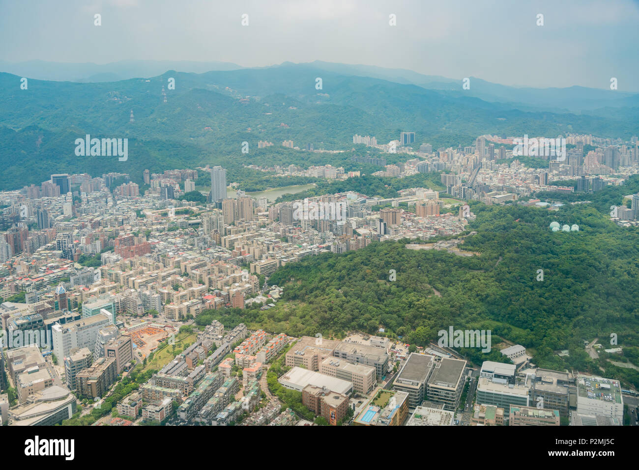 Aerial view of the beautiful Taipei City, from an airplane window seat ...