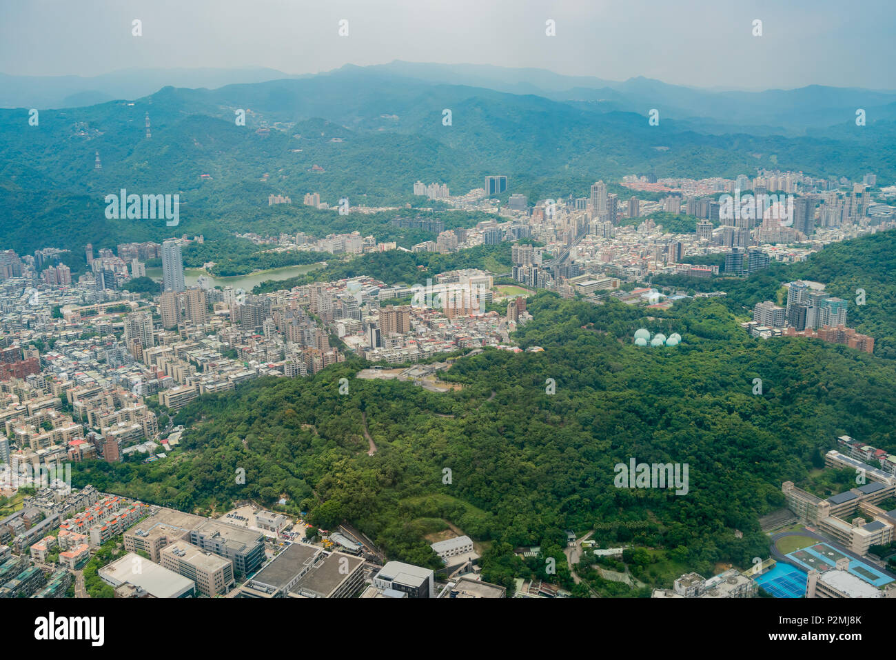 Aerial view of the beautiful Taipei City, from an airplane window seat ...