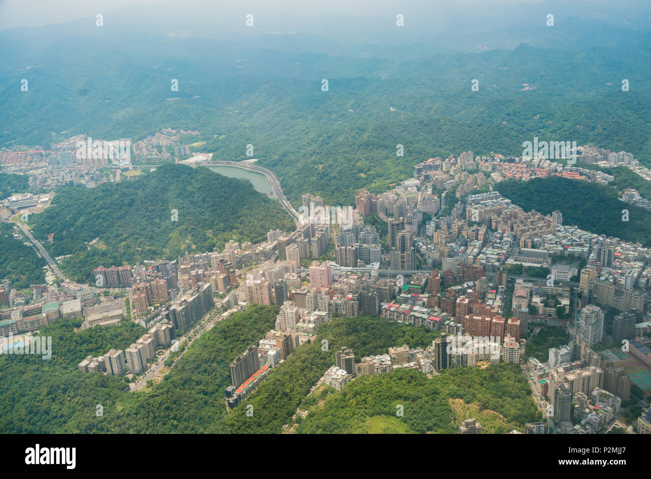 Aerial view of the beautiful Taipei City, from an airplane window seat ...