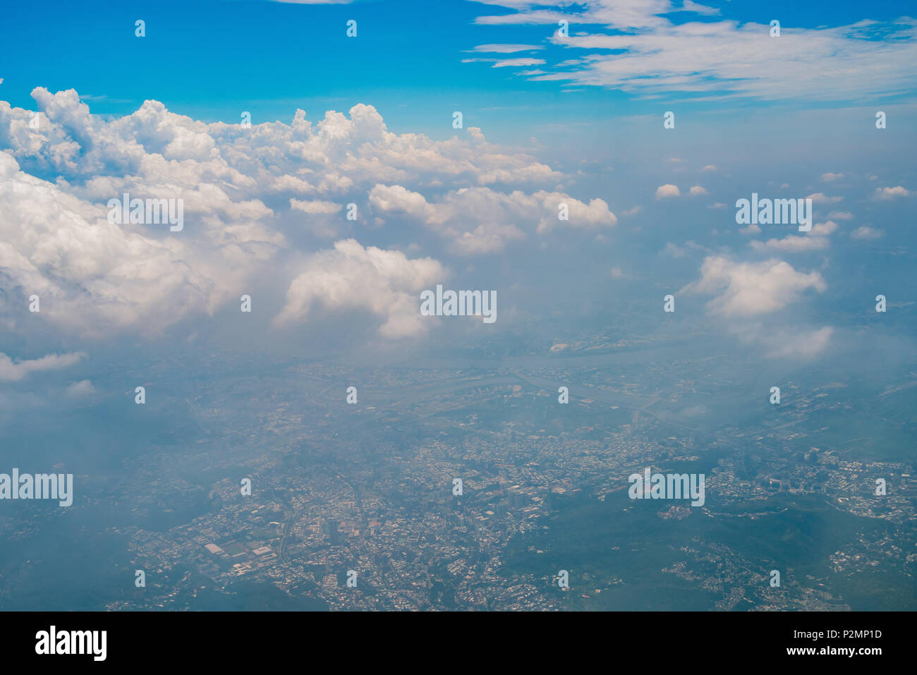 Aerial view of the beautiful Taipei City, from an airplane window seat ...