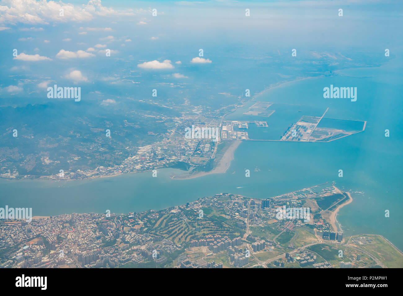 Aerial view of the beautiful Taipei City, from an airplane window seat ...