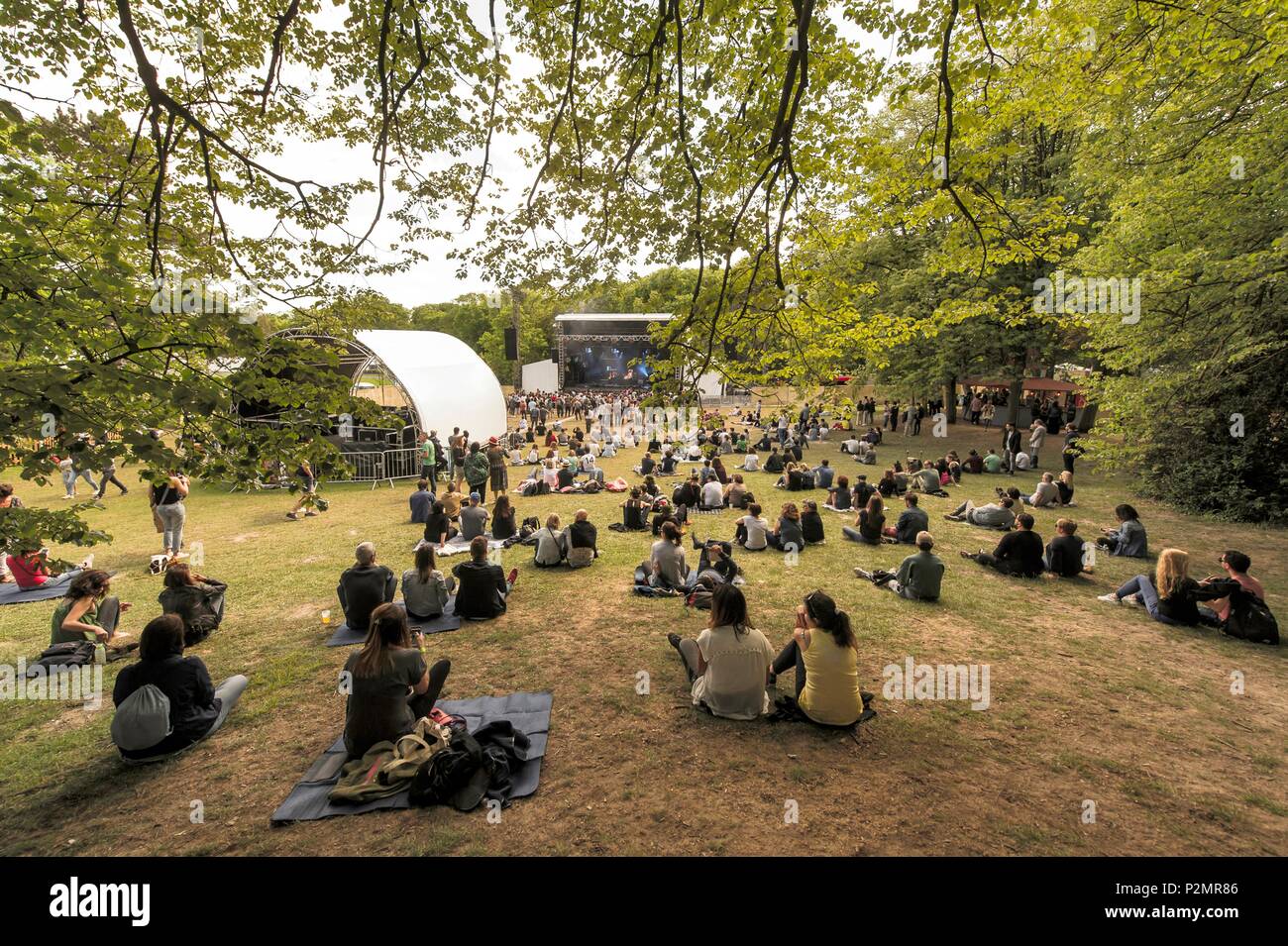 France, Marne, Reims, sitting crowd in front of a concert during the ...