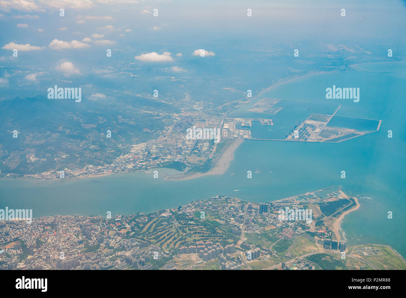 Aerial view of the beautiful Taipei City, from an airplane window seat ...