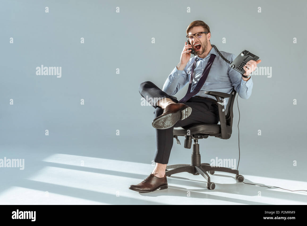 Annoyed businessman hi-res stock photography and images - Alamy