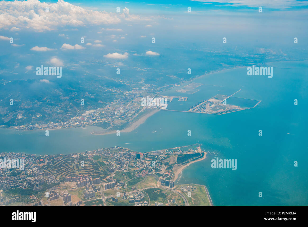 Aerial view of the beautiful Taipei City, from an airplane window seat ...