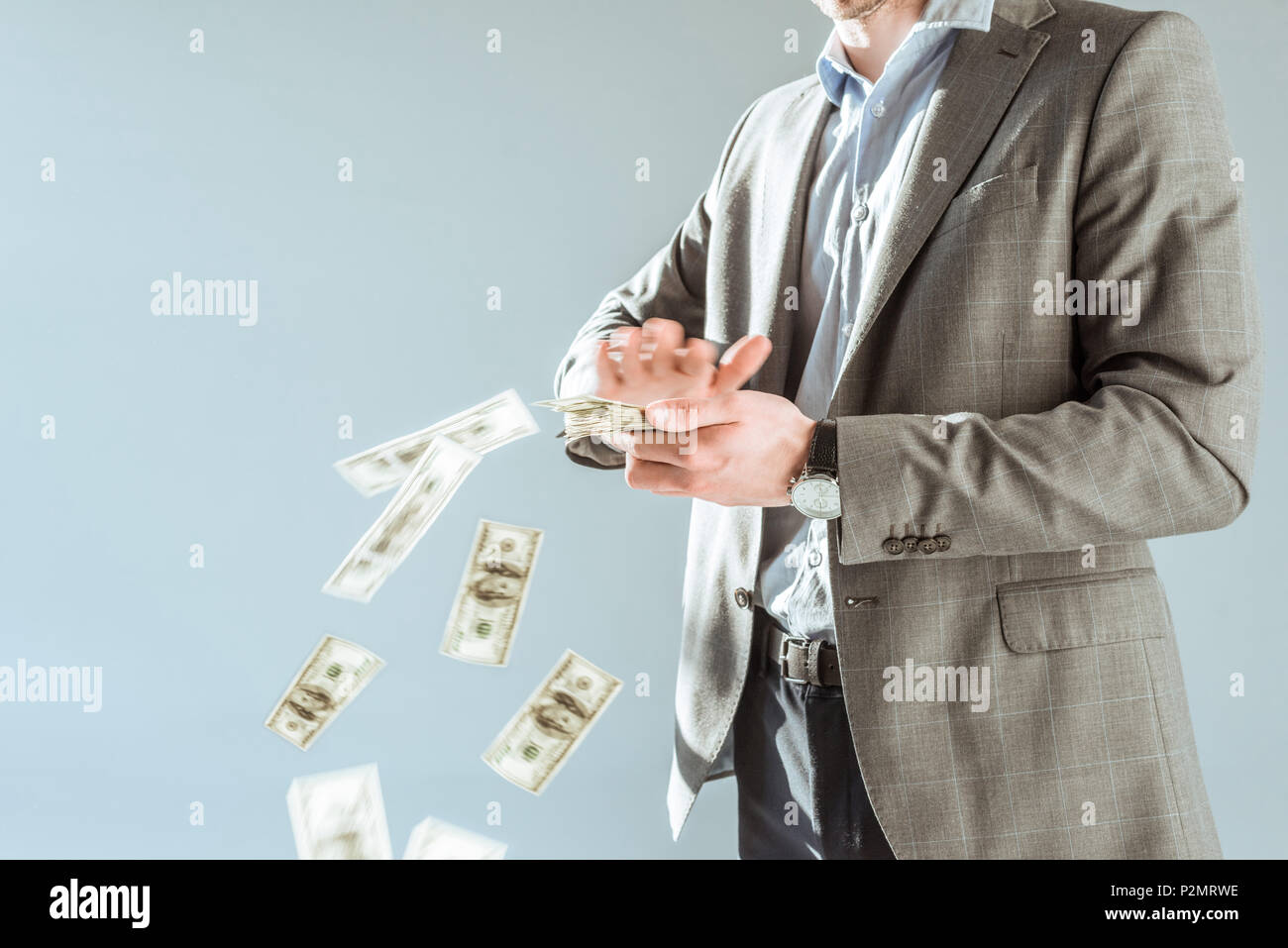 Person throwing money hi-res stock photography and images - Alamy