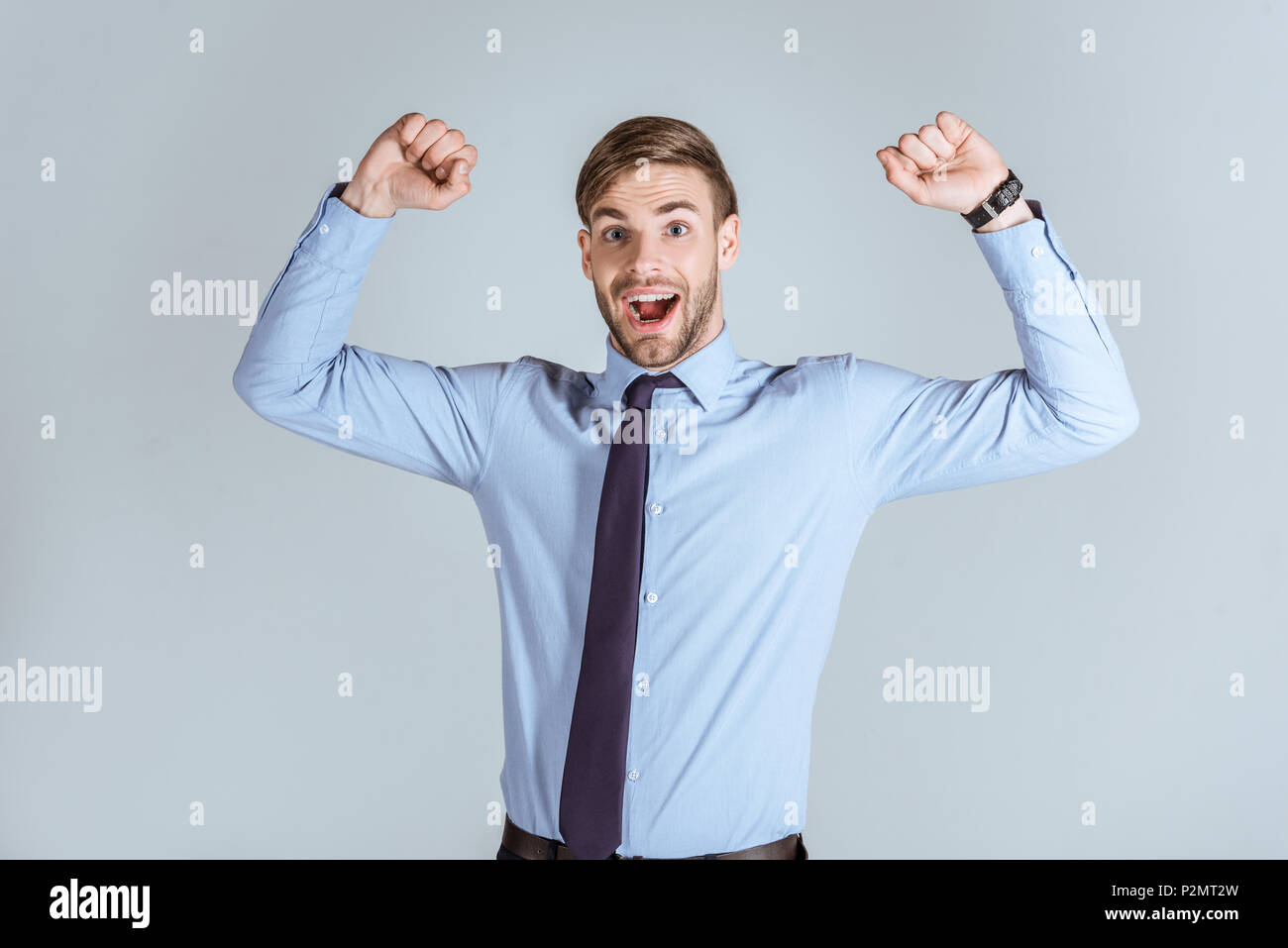 Man strong arms up isolated hi-res stock photography and images - Alamy