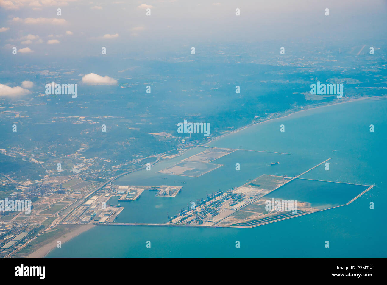 Aerial view of the beautiful Taipei City, from an airplane window seat ...