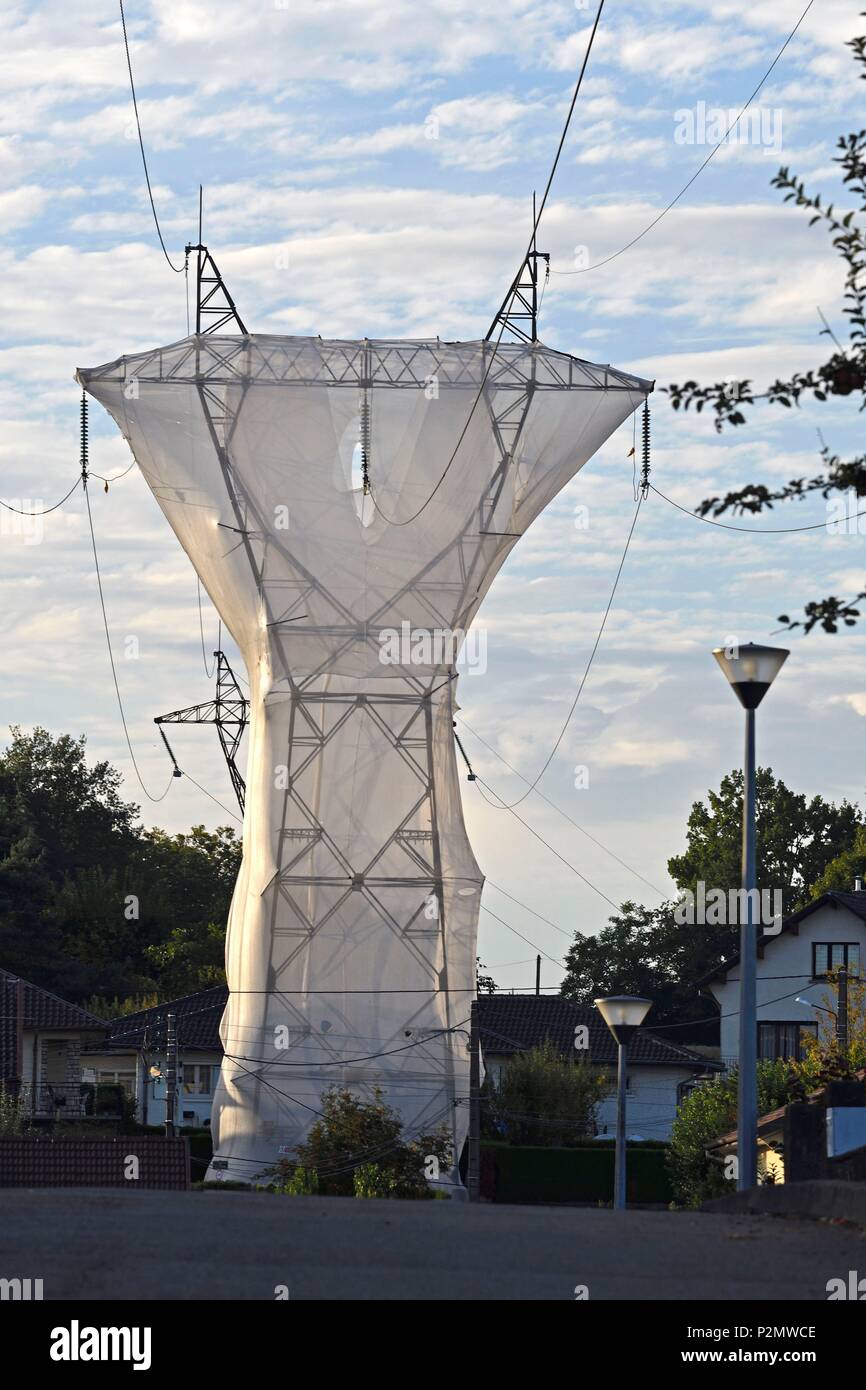 France, Doubs, Nommay, electric pylon, fabric wrapping the structure ...