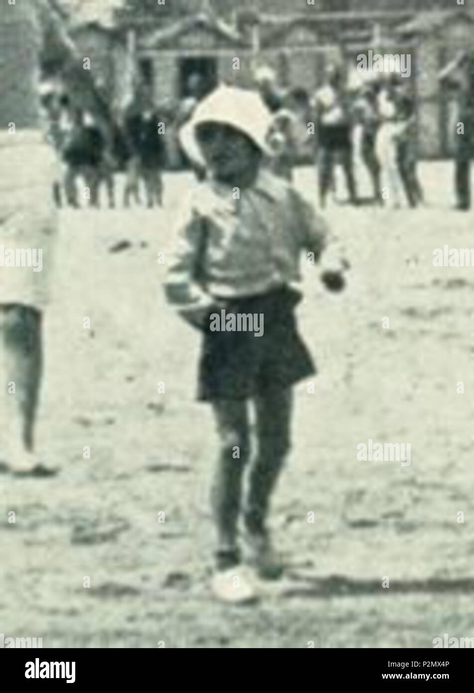. Italiano: Benito Mussolini con il figlio Romano sulla spiaggia di ...