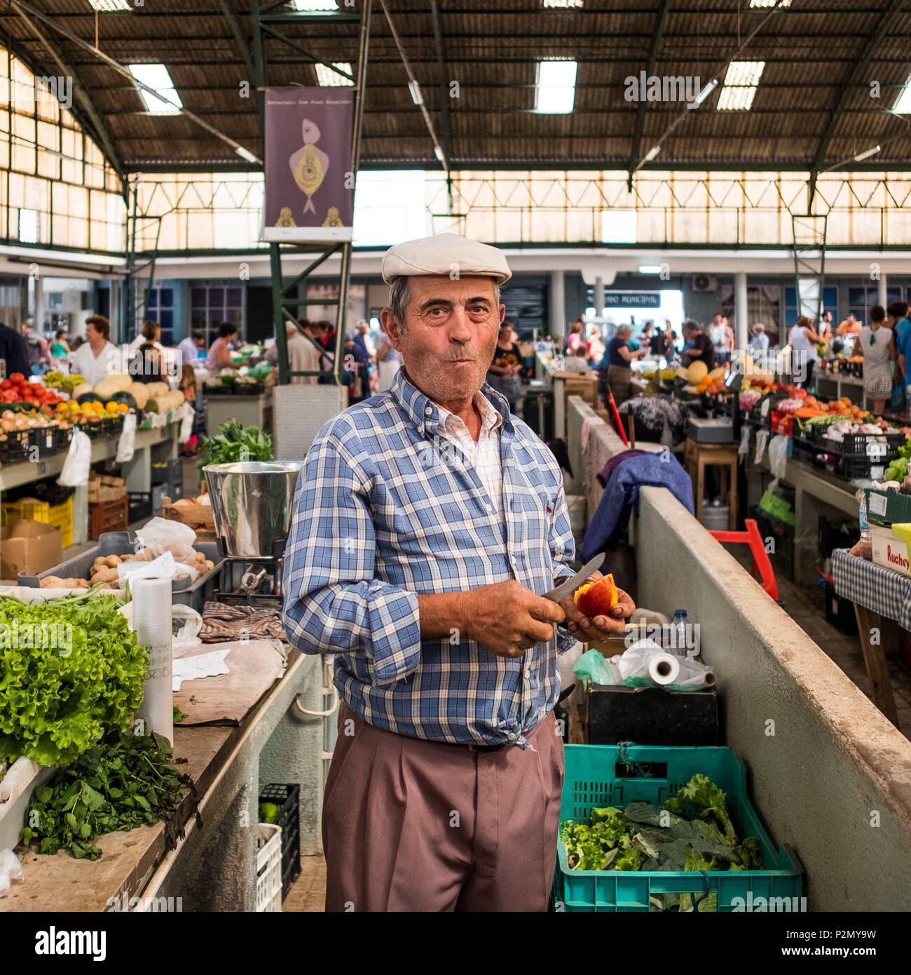 Portugal, Center Region, Nazaré, Portrait of merchant at the market ...