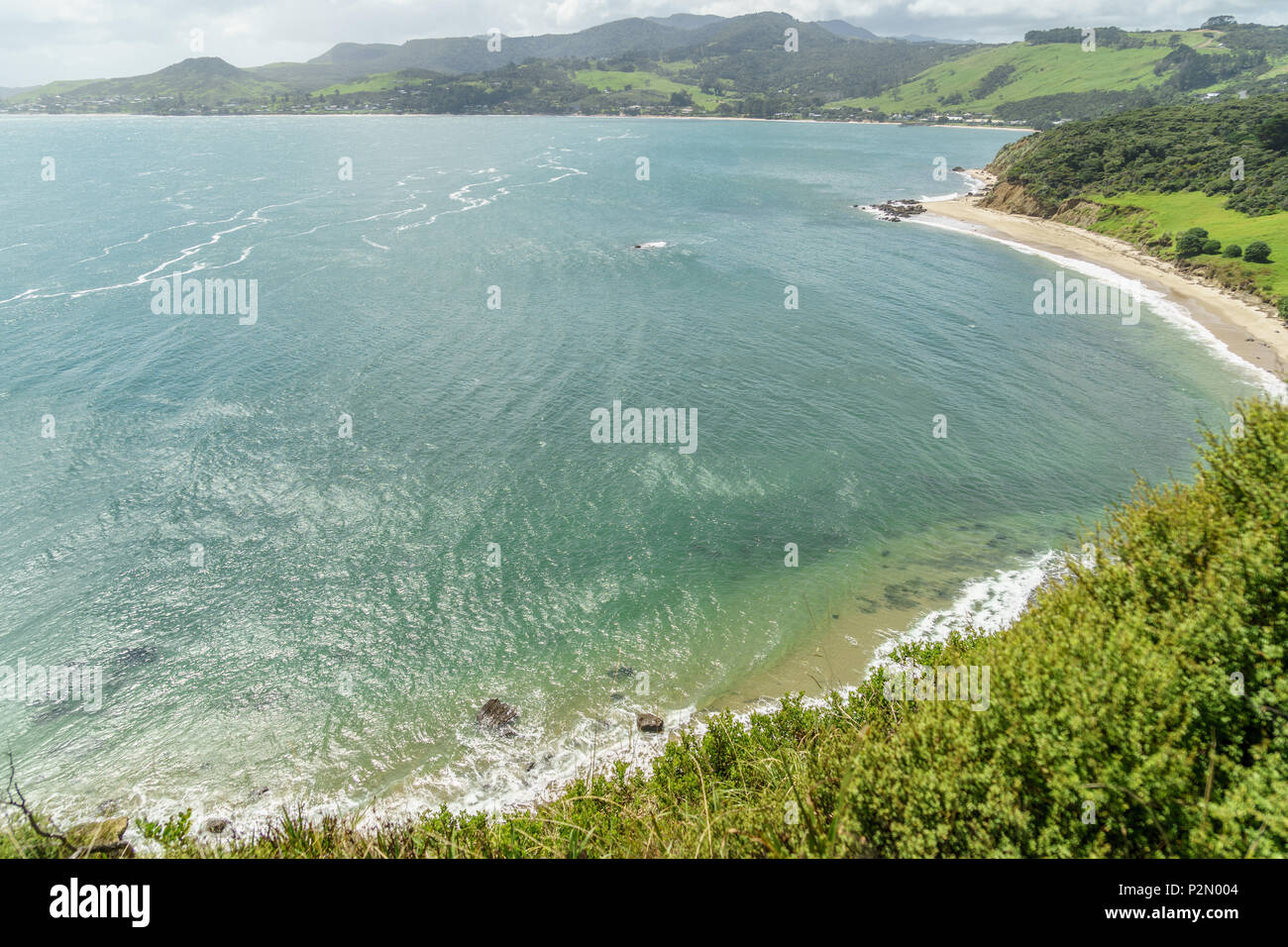 aerial view of ocean coastline on sunny day, Omapere, New Zealand Stock ...