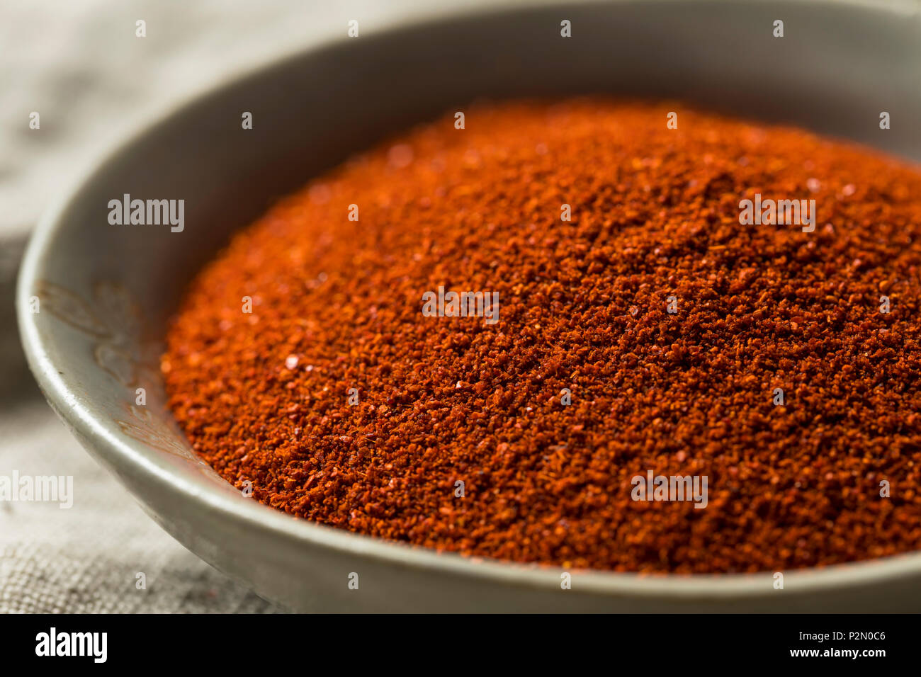 Dry Organic Red Smoked Paprika in a Bowl Stock Photo - Alamy