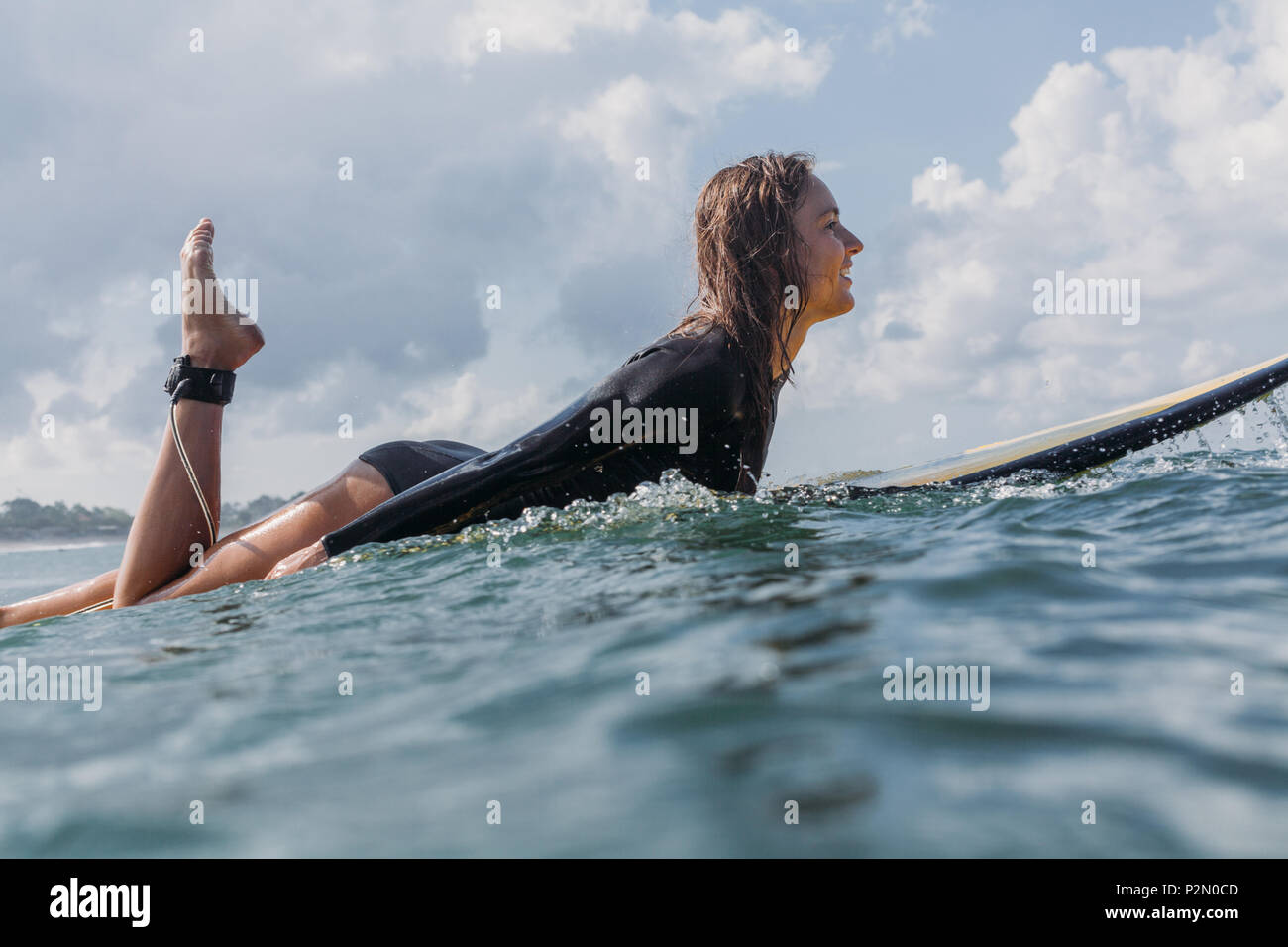 Swimming on the board hi-res stock photography and images - Alamy
