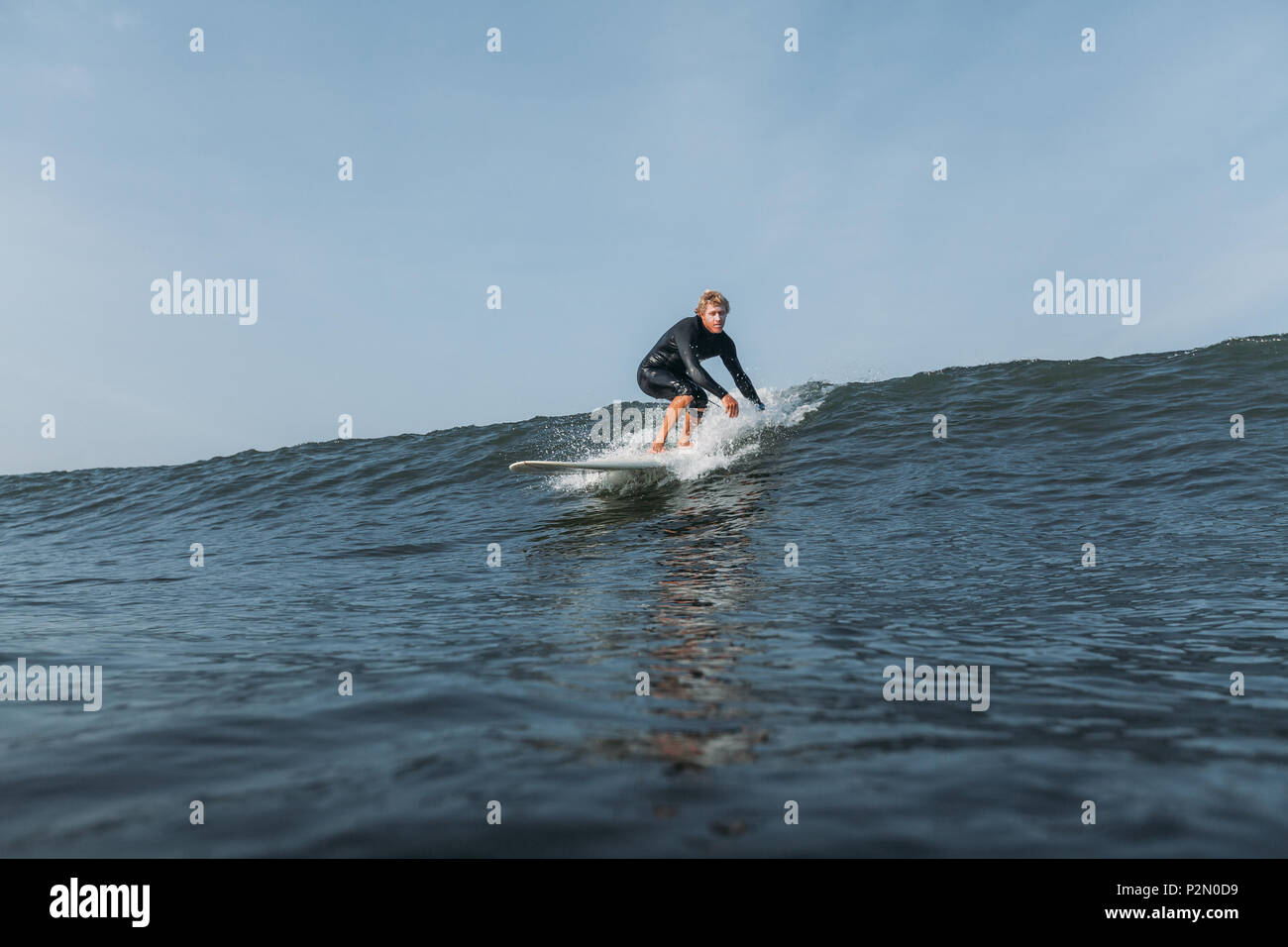 Surfer riding wave on hi-res stock photography and images - Alamy