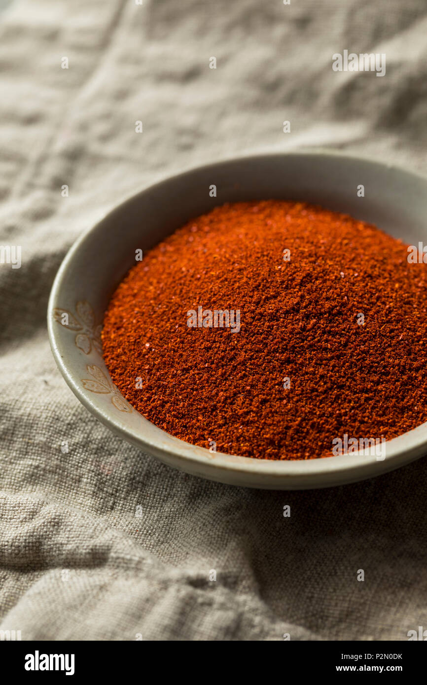 Dry Organic Red Smoked Paprika in a Bowl Stock Photo - Alamy
