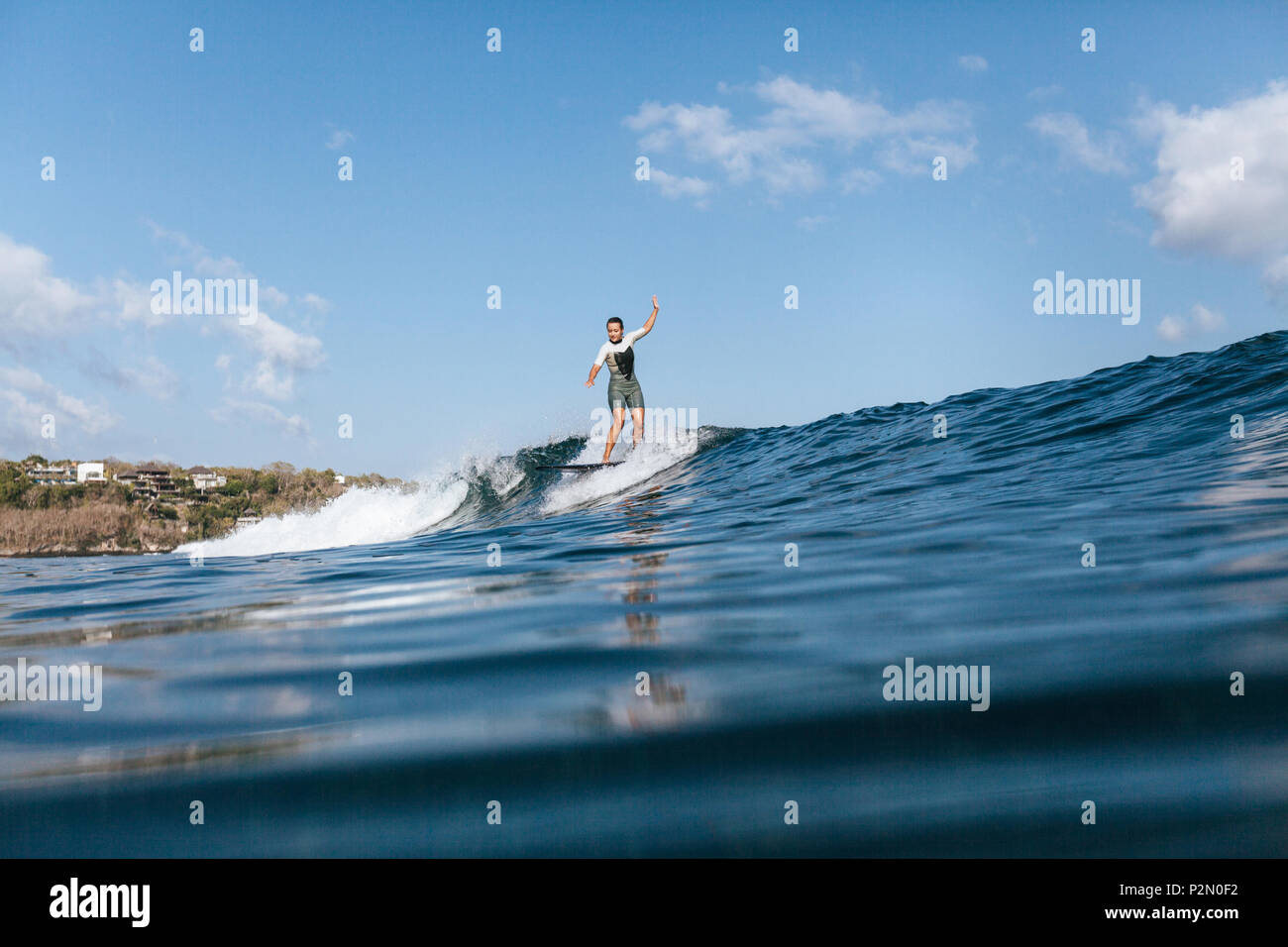 Girl riding wave hi-res stock photography and images - Alamy