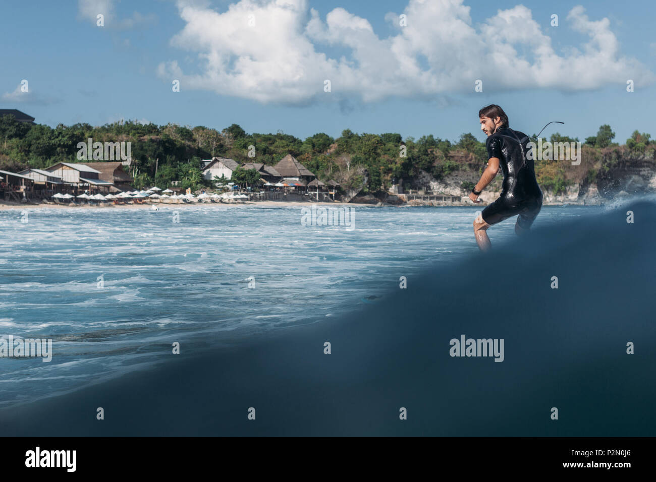 Man riding wave hi-res stock photography and images - Alamy