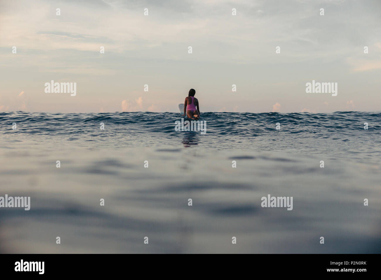 Back view girl in swimsuit hi-res stock photography and images - Alamy