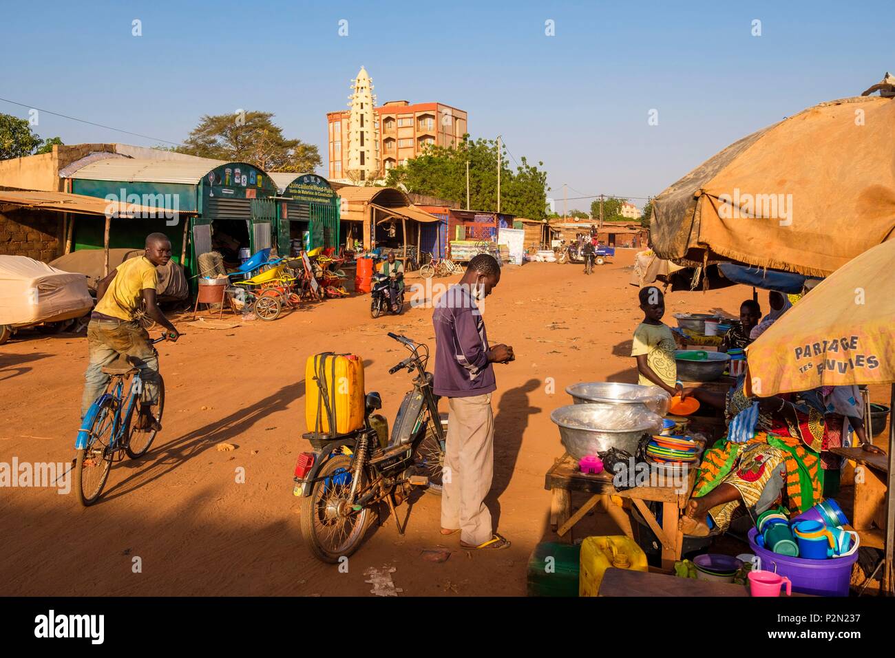Burkina Faso, Boulkiemdé province, Koudougou, dirt road and the minaret ...