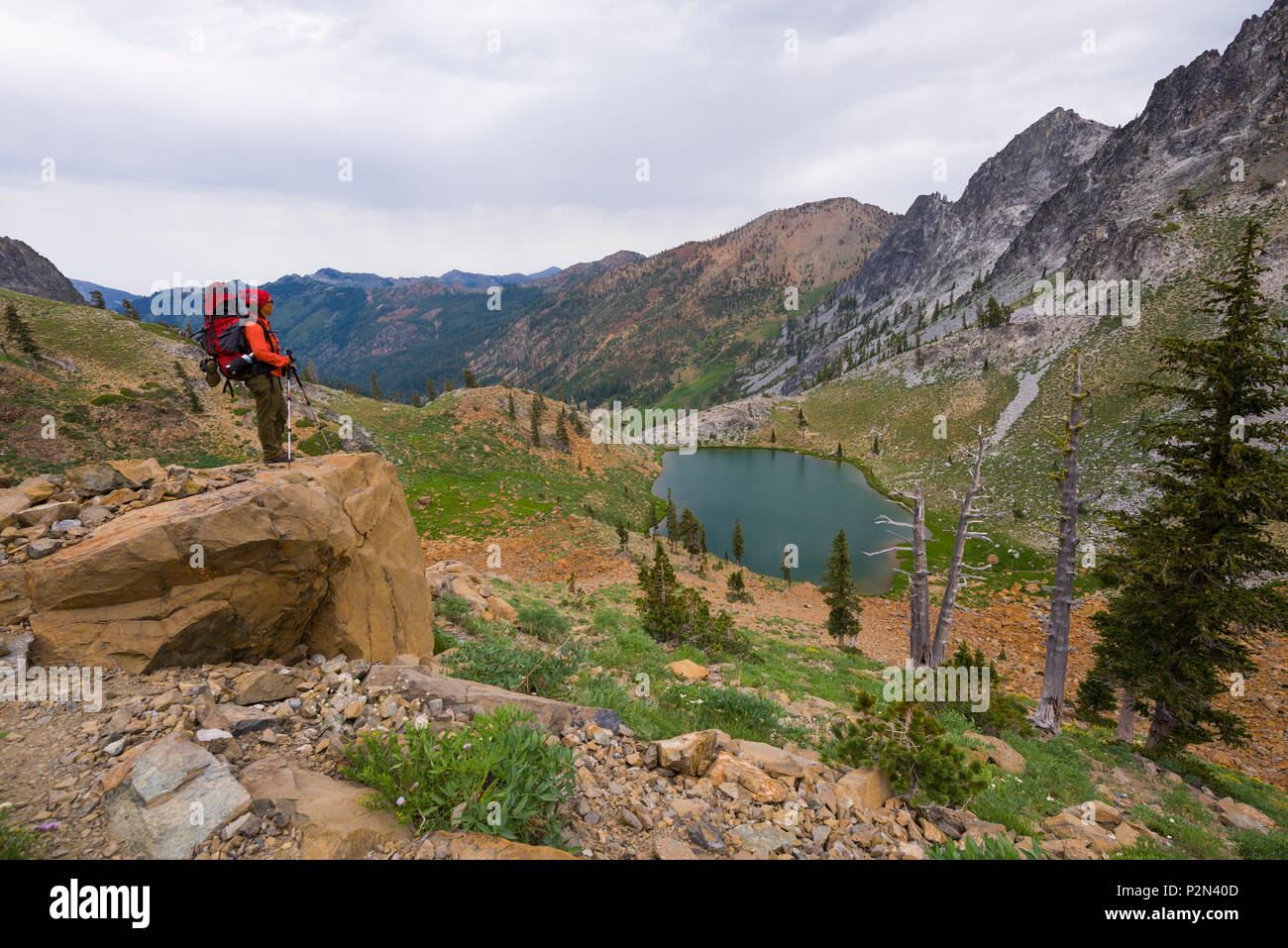 Backpacker above Deer Lake in the Trinity Alps wilderness Four Lakes ...