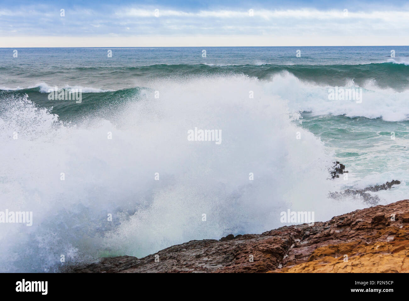 White-capped crashing waves and high surf, with storm coming, at Point ...