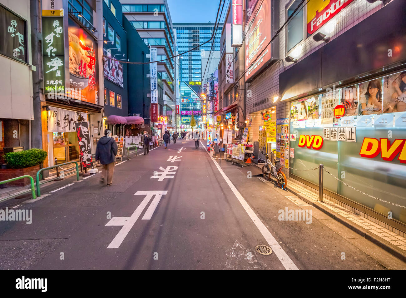 Pedestrians in side street during blue hour at Akihabara, Chiyoda-ku ...