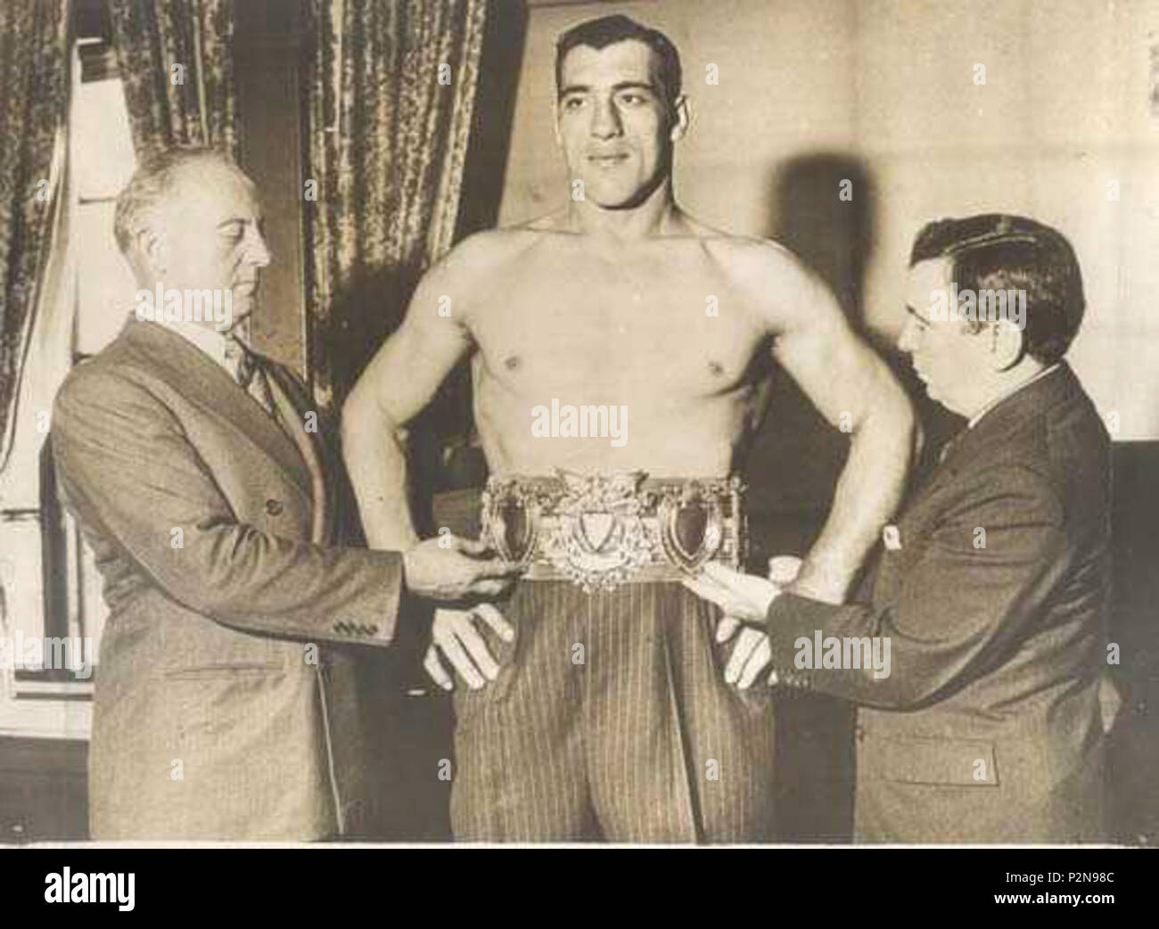 . Primo Carnera receives the world champion belt . 6 October 1933 ...