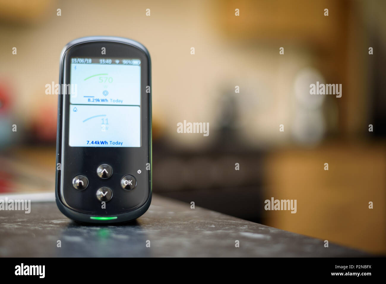 Domestic Energy Smart Meter on a Kitchen Worktop Displaying Energy ...