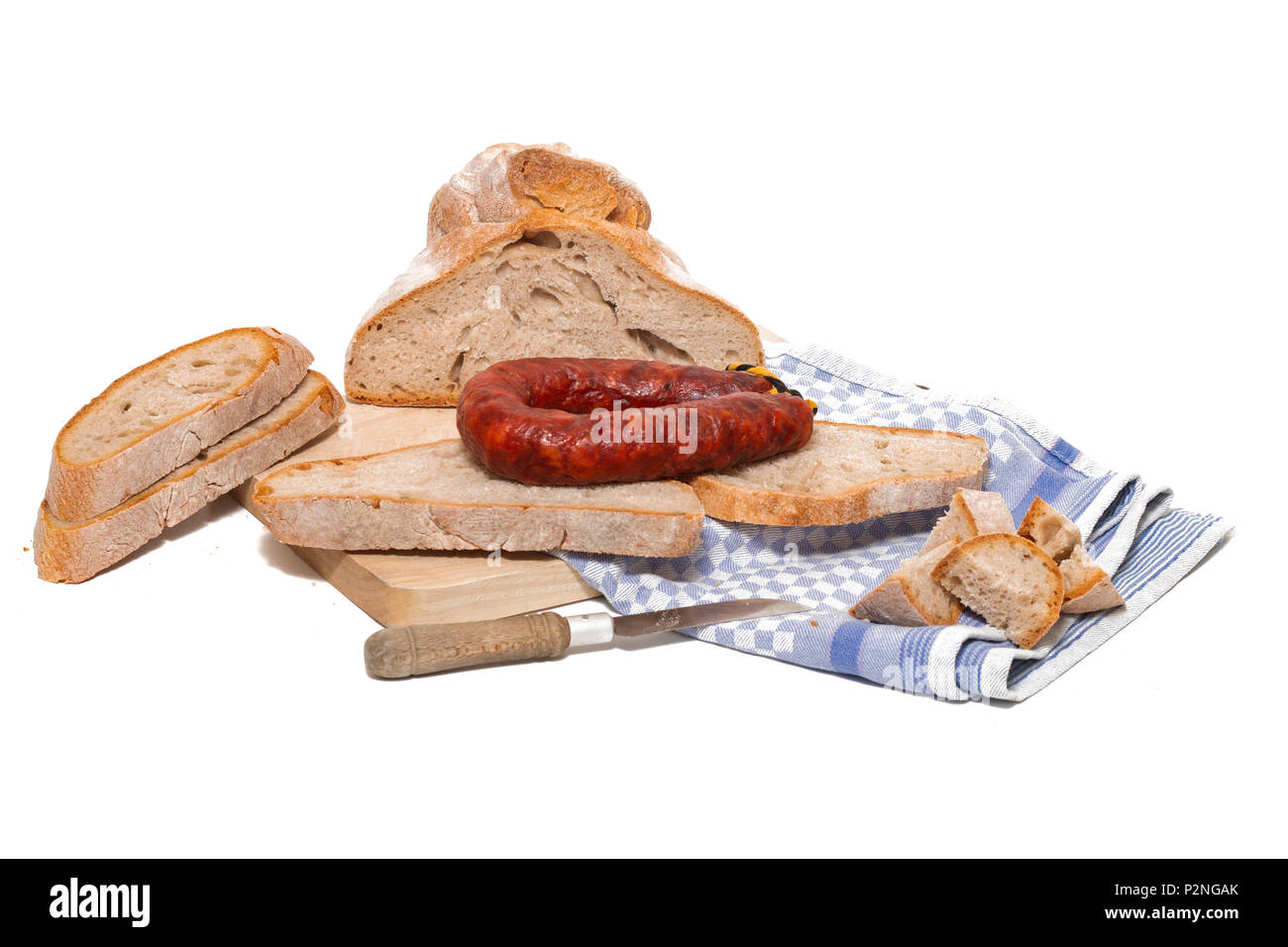chorizo and traditional bread slices isolated on a white background ...