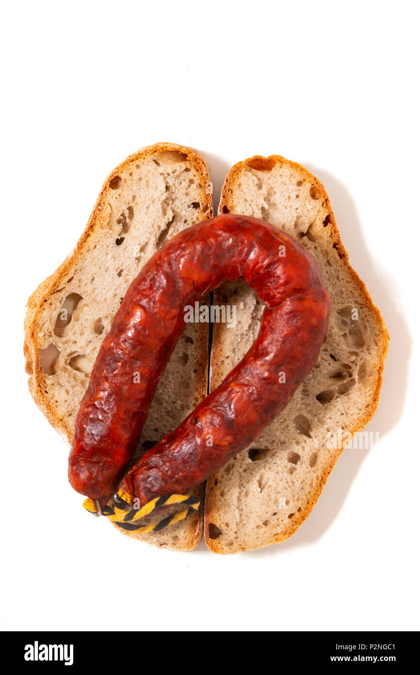chorizo and traditional bread slices isolated on a white background ...