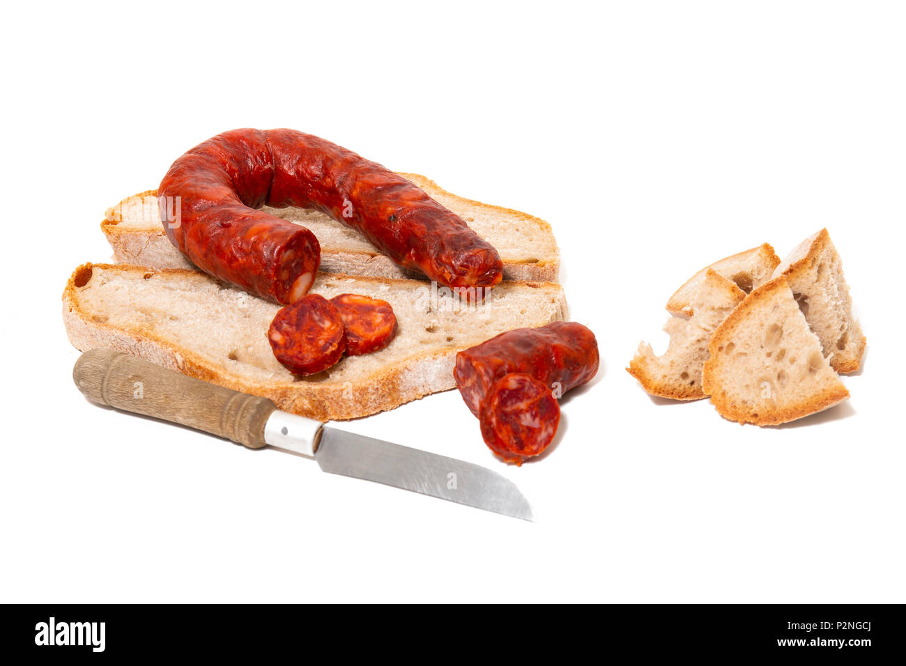 chorizo and traditional bread slices isolated on a white background ...