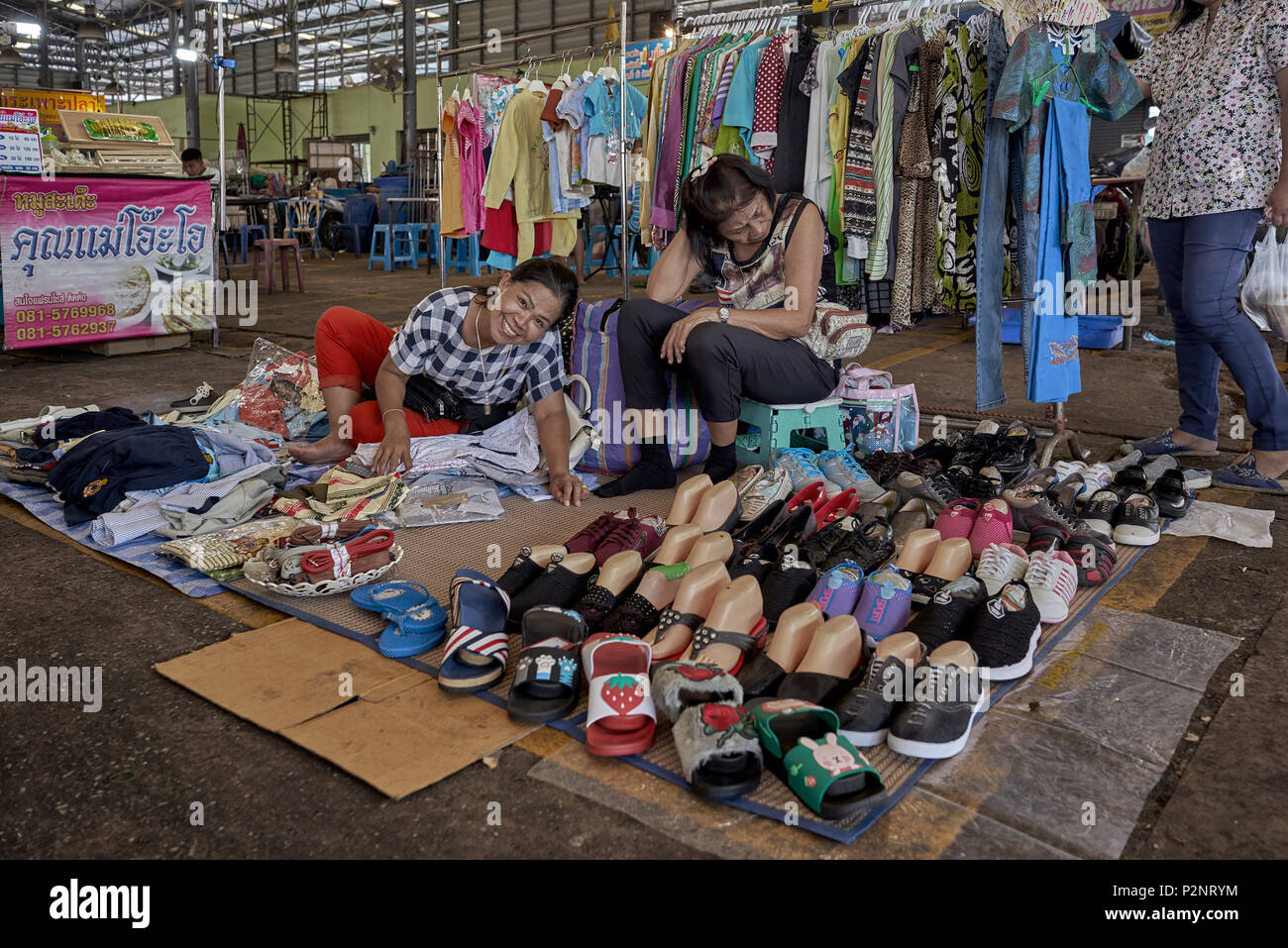 Thailand market, shoe sales, female vendor Stock Photo - Alamy