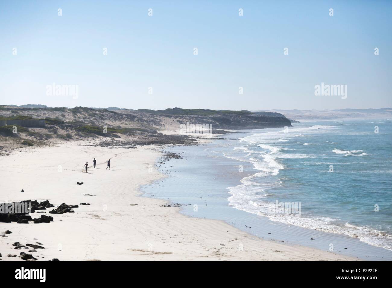 South Africa, Western Cape, Strollers on a white sand beach in the ...