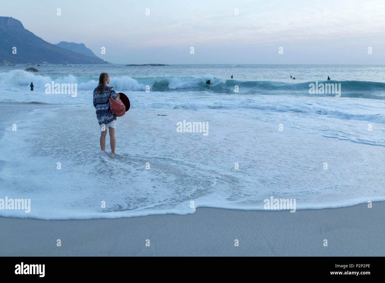 South Africa, Western Cape, Sunset walker on Camps Bay Beach Stock ...