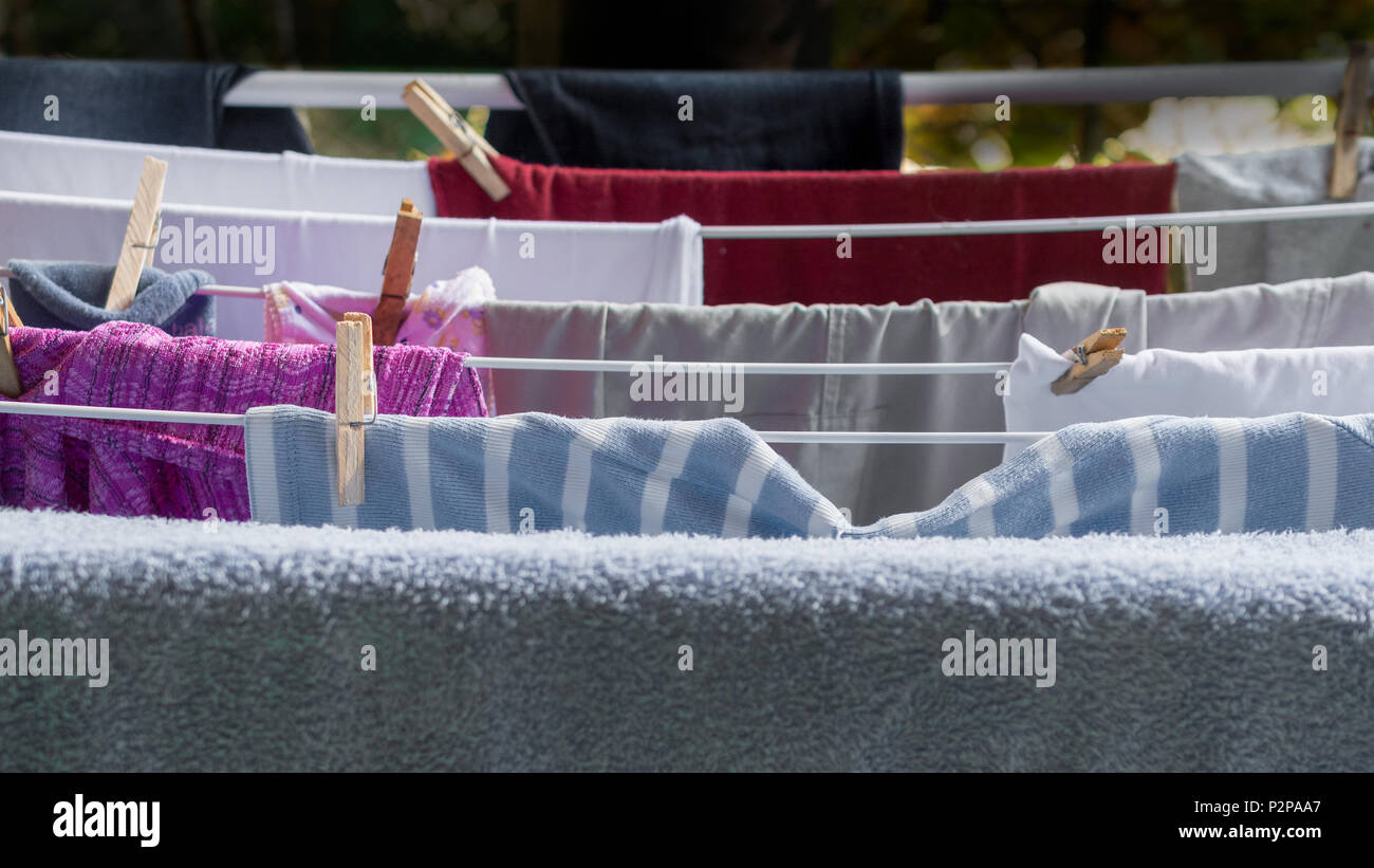 Clothes hanging on clotheslines clothes line hi-res stock photography ...