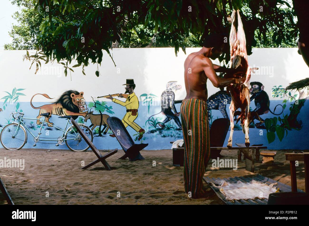 Ivory Coast, Grand Bassam, outdoor butcher shop Stock Photo - Alamy
