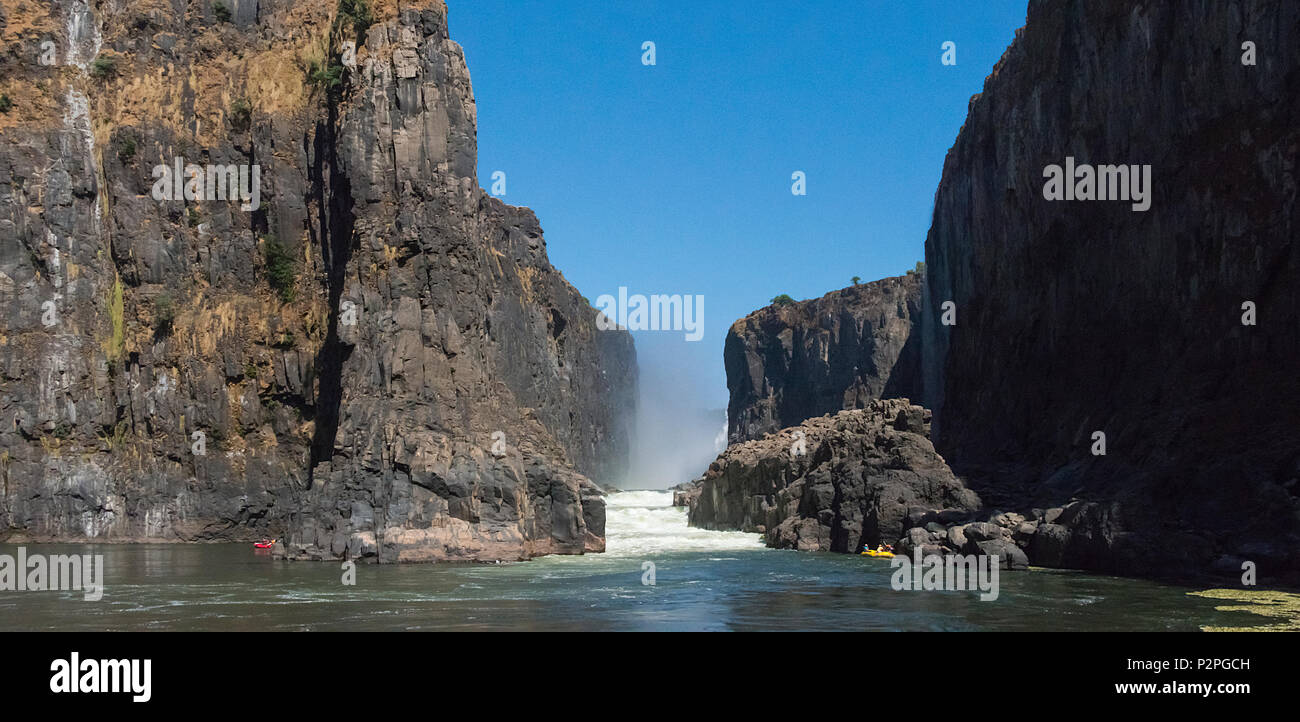 Tourists rafting at the bottom of Victoria Falls, Zimbabwe Stock Photo ...