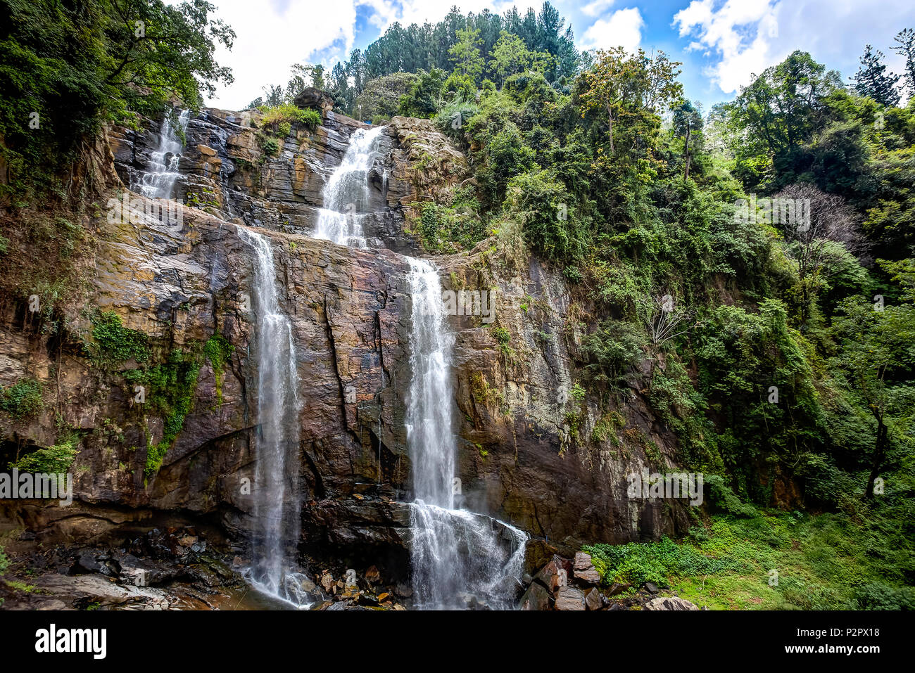 View of a jungle waterfall, called Ramboda, between tea estates in Sri ...