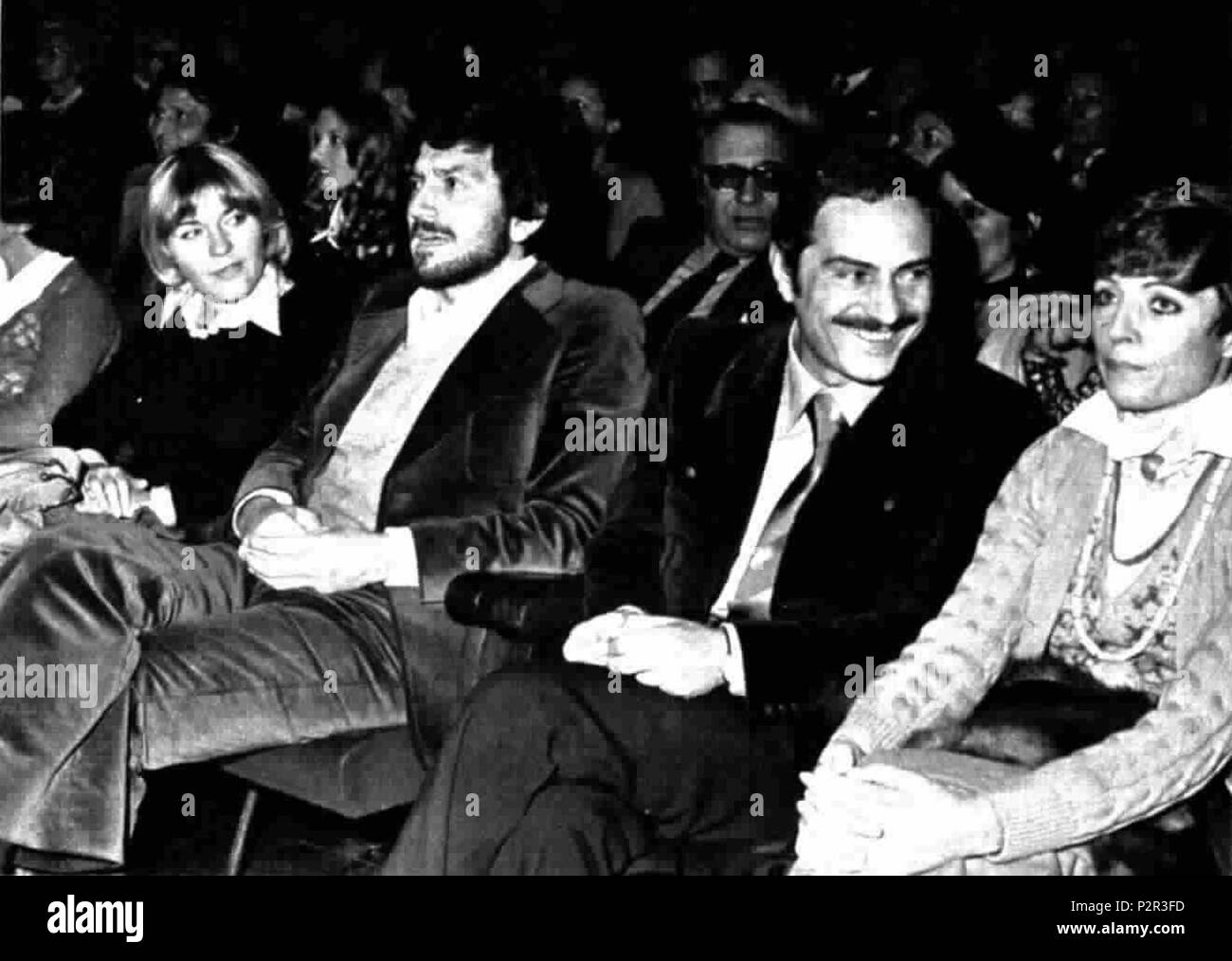 . Italian actors Gigi Proietti and Nino Manfredi attend a concert of ...