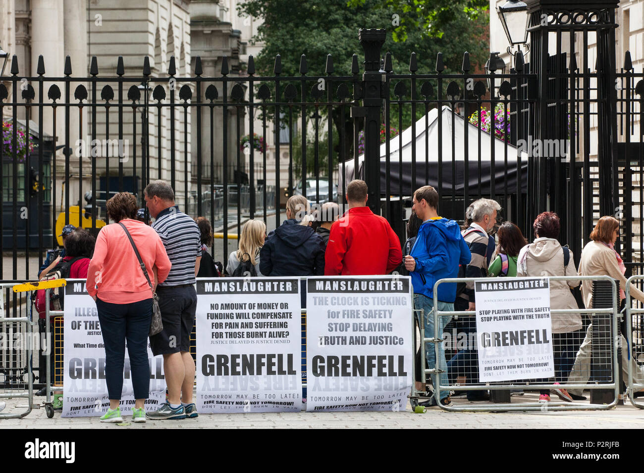 London, UK. 16th June, 2018. Posters outside Downing Street during the ...