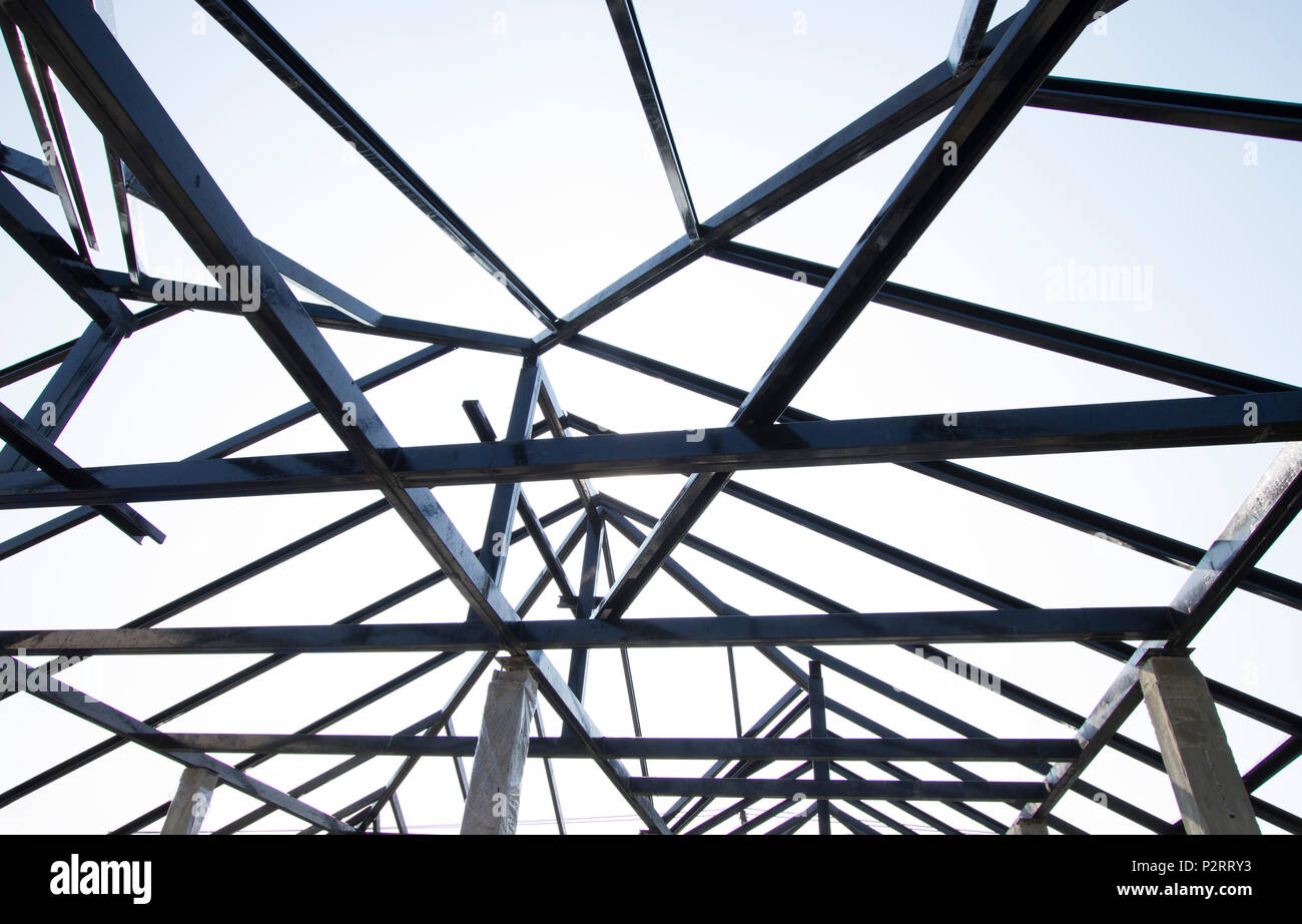 Steel structure with blue sky background Stock Photo - Alamy